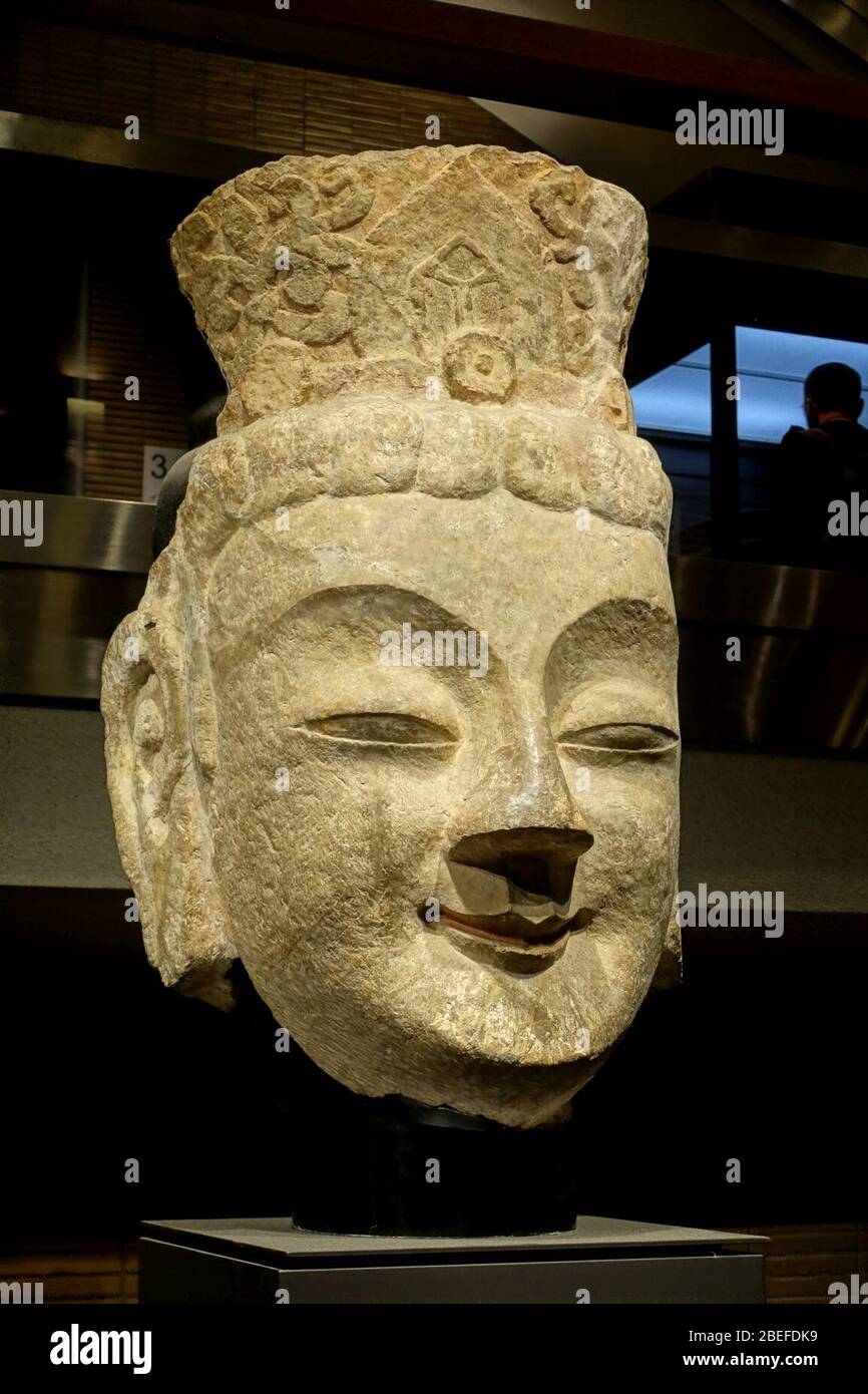 Head of bodhisattva, Binyangdon Caves, Longmen Grottoes, Henan province ...