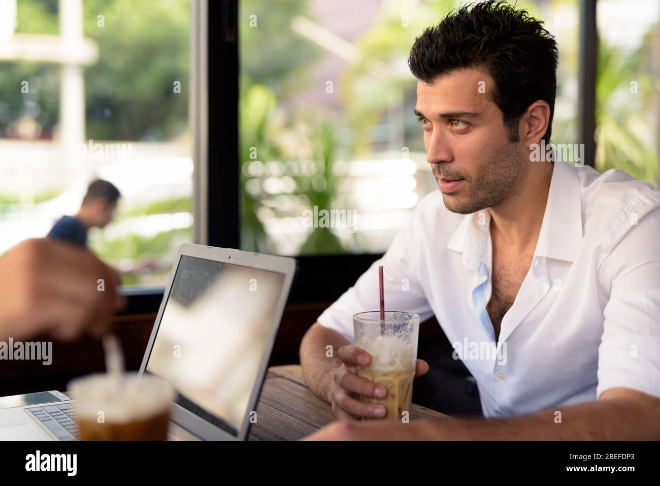 Portrait of handsome Turkish man relaxing at the coffee shop Stock ...