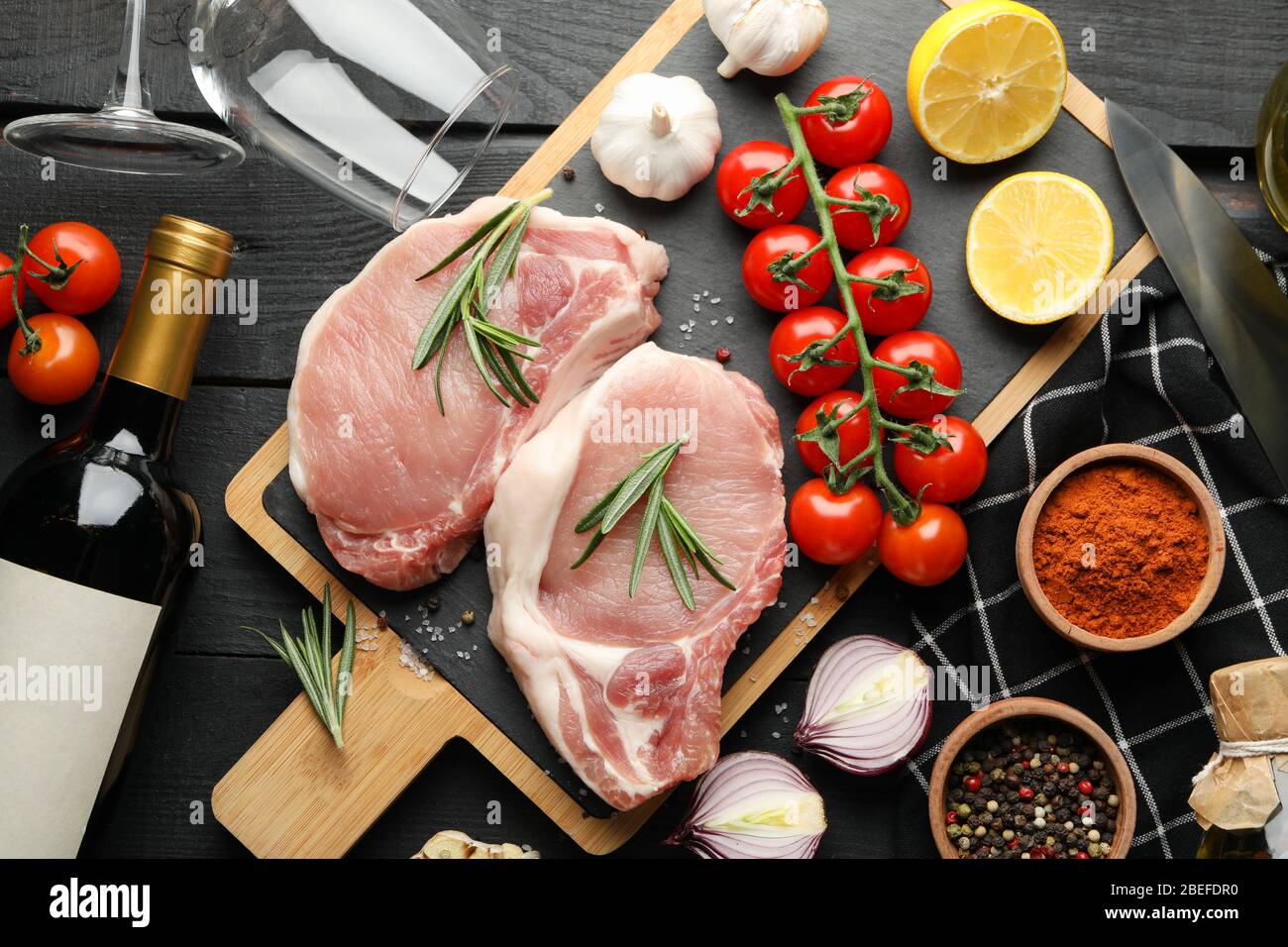 Composition with raw meat and ingredients. Cooking steak concept Stock ...