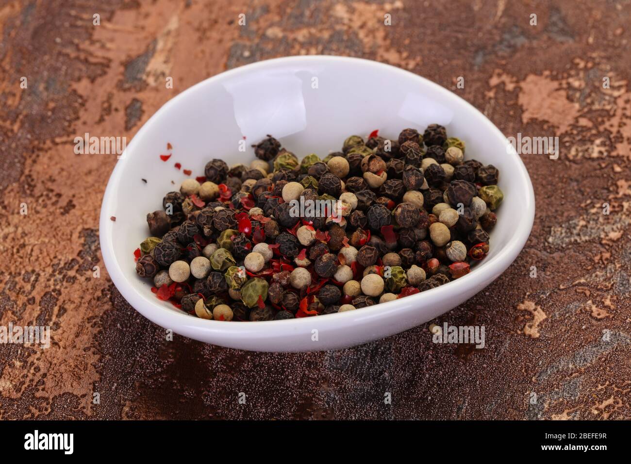Pepper corn mix - black, red, white and green Stock Photo - Alamy