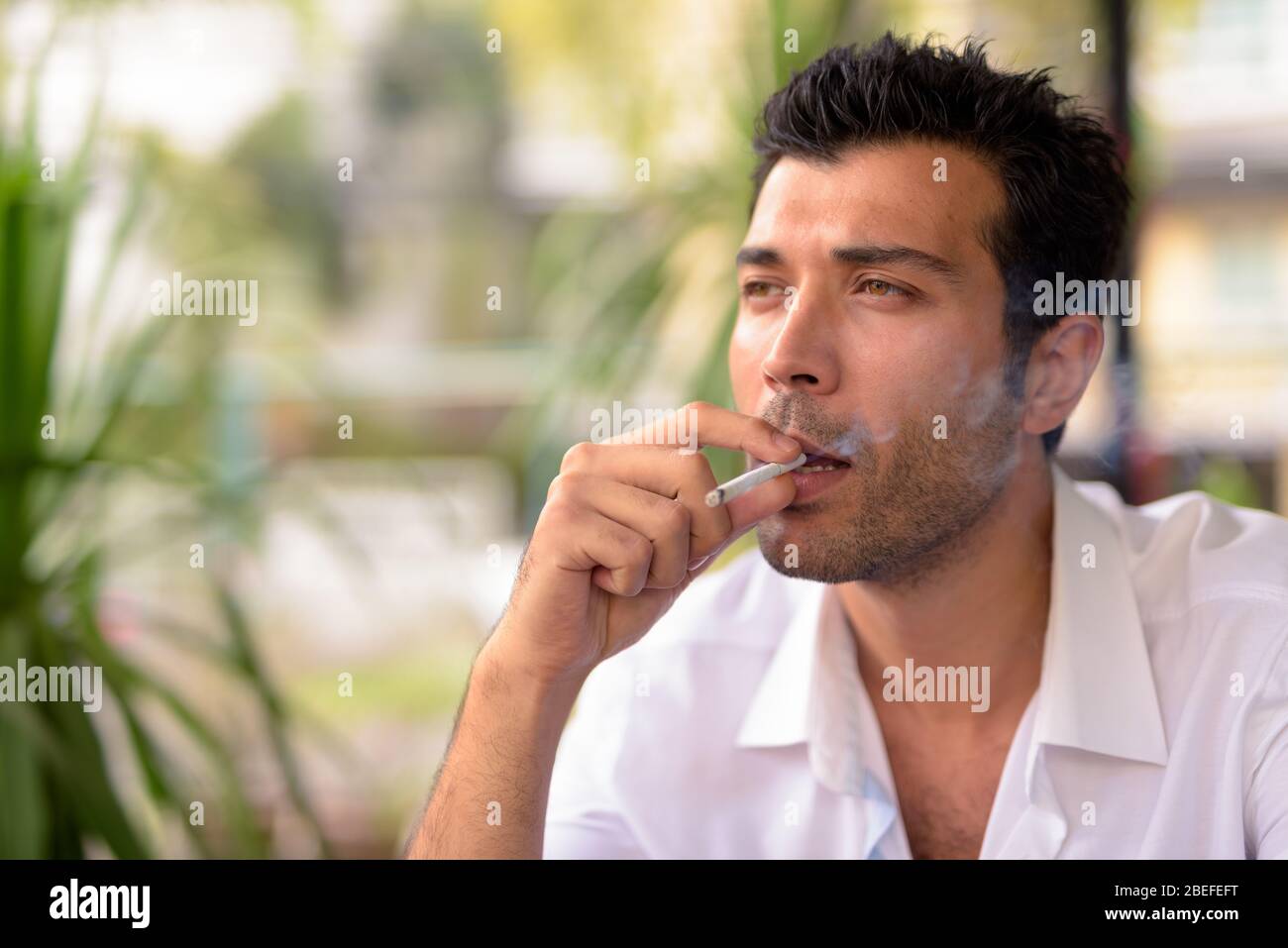 Face of handsome Turkish man at the coffee shop Stock Photo - Alamy