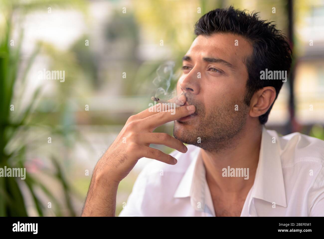 Face of handsome Turkish man at the coffee shop Stock Photo - Alamy
