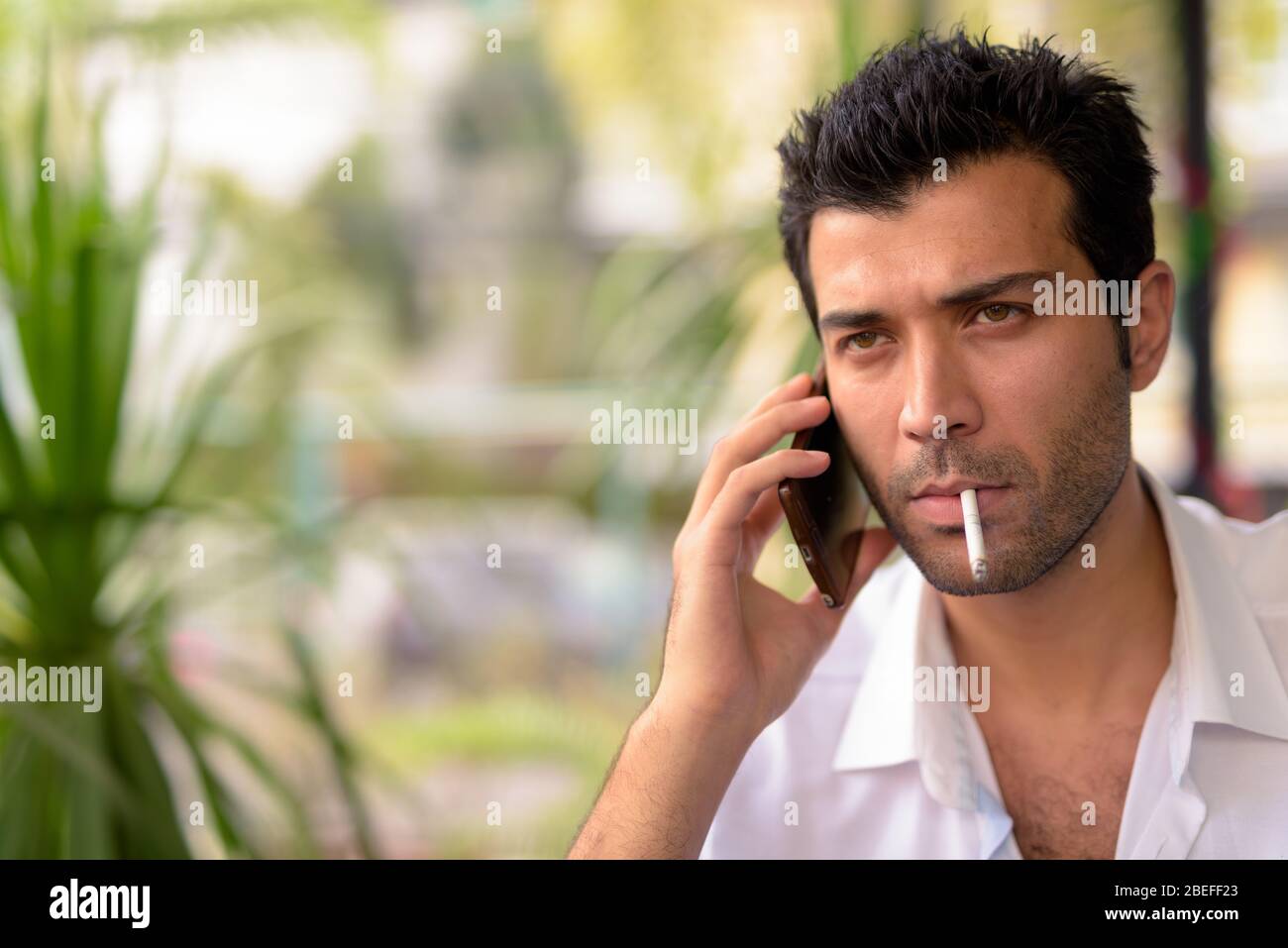 Face of handsome Turkish man at the coffee shop Stock Photo - Alamy