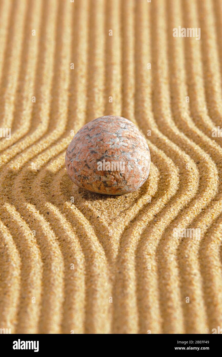 Japanese ZEN garden with stone in textured sand Stock Photo - Alamy