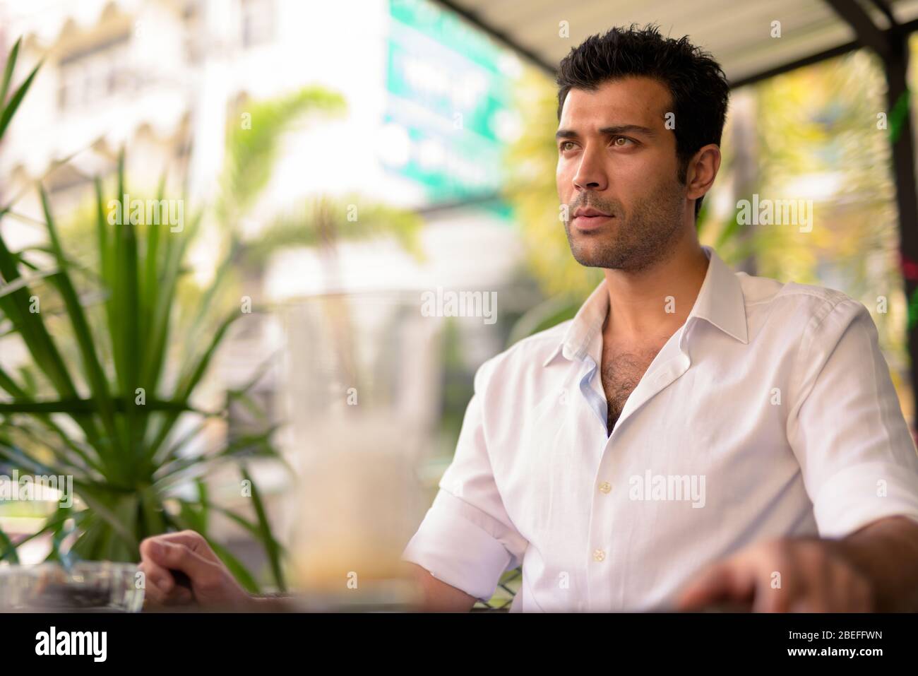 Portrait of handsome Turkish man relaxing at the coffee shop Stock ...