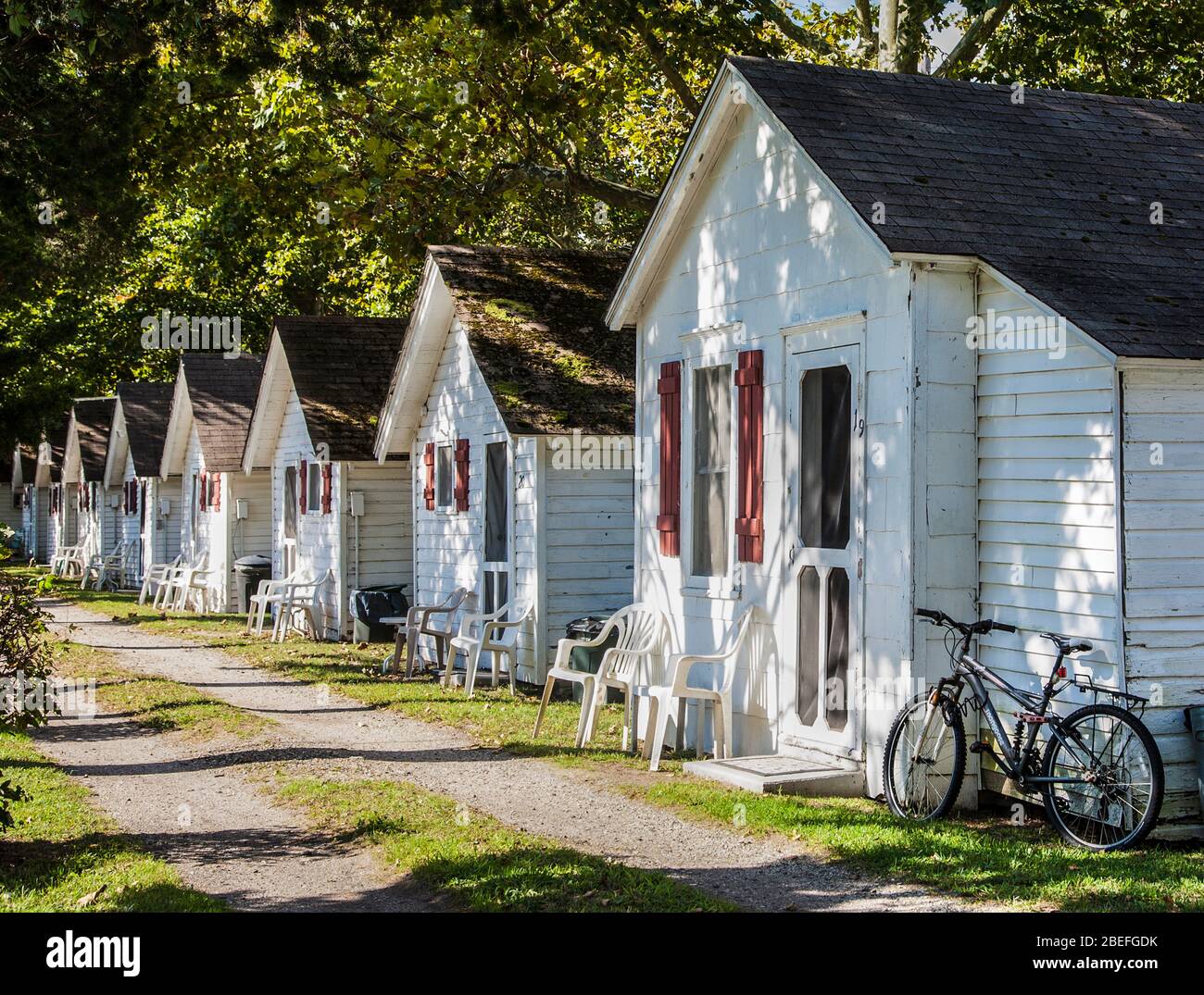 Vintage summer white beach Cottages with red shutters, Cape May, New ...