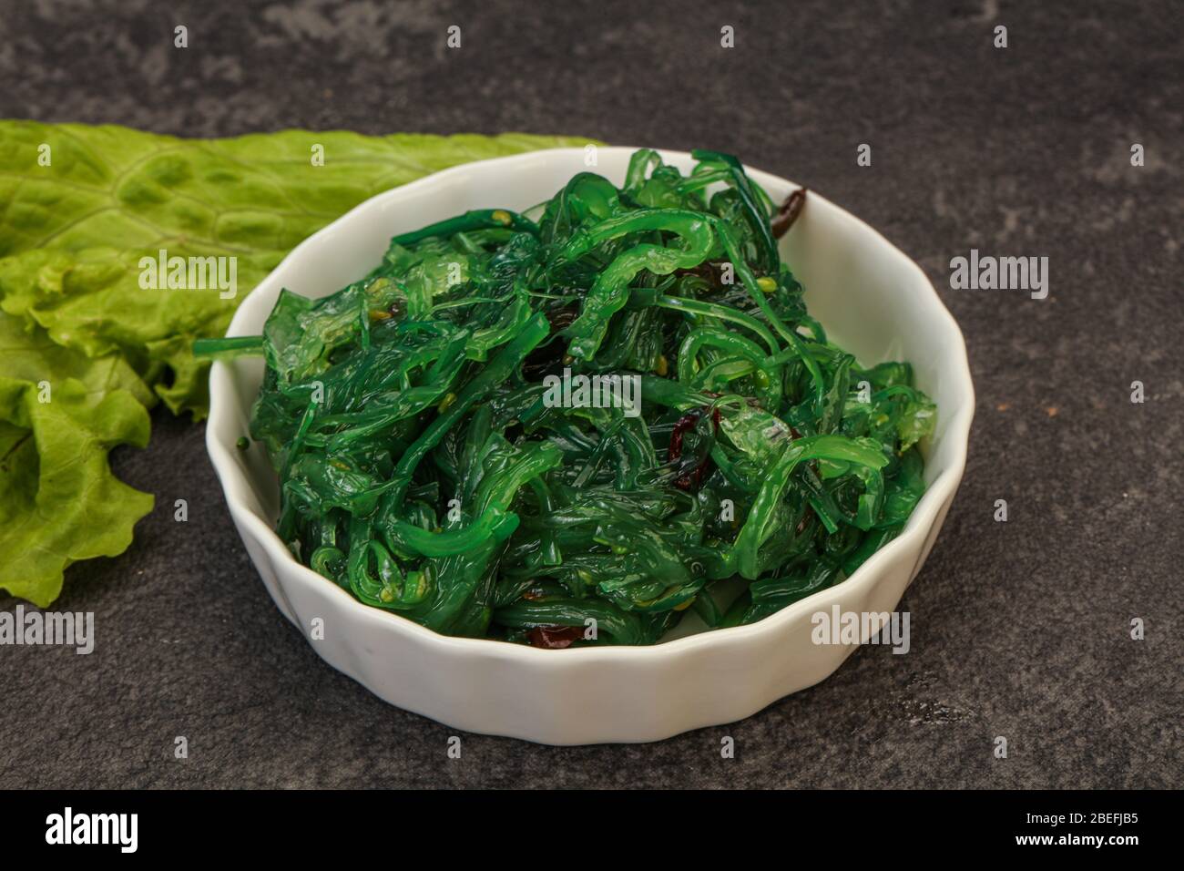 Green Chuka Seaweed Salad Isolated on White Background Top View. Wakame Sea Kelp Salat, Chukka ...