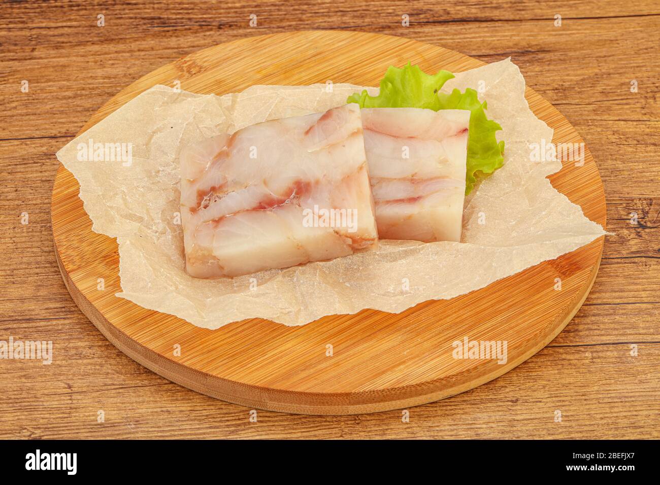 Raw dietary pollock fish fillet for cooking Stock Photo - Alamy