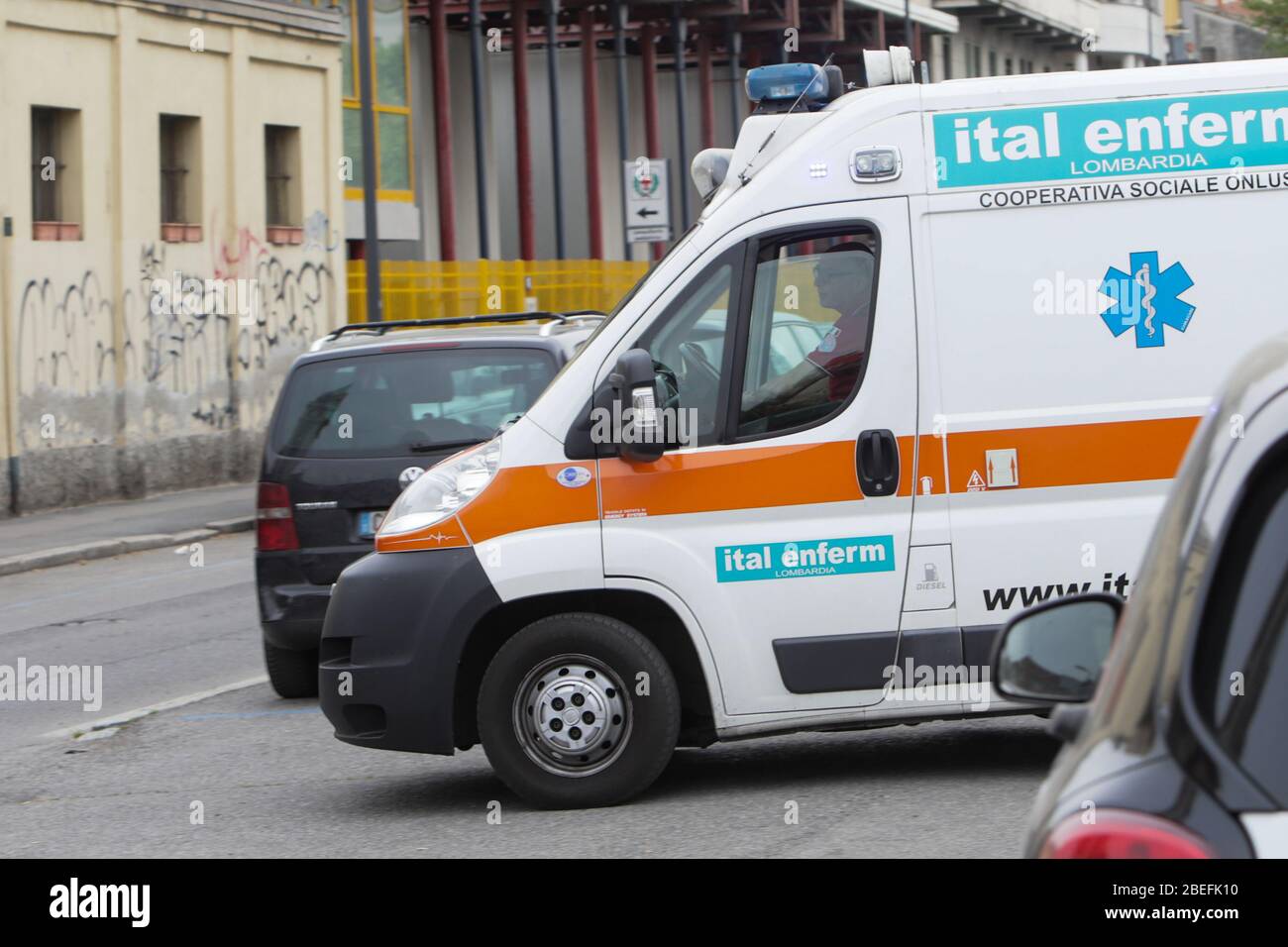 An ambulance comes out of Buzzi's hospital with sirens blazing during ...