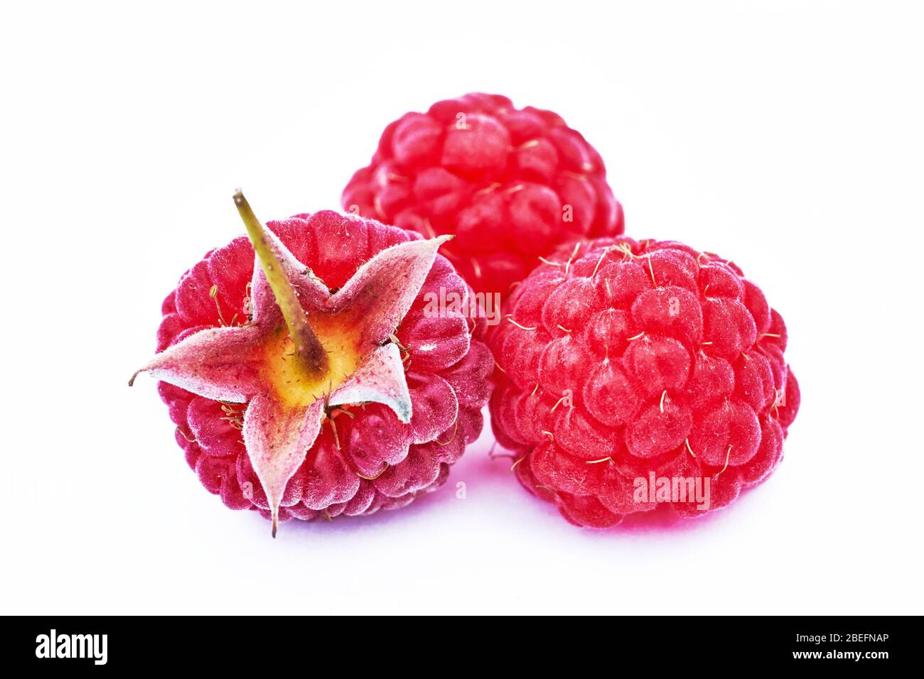 Ripe raspberries isolated on white background cutout Stock Photo - Alamy