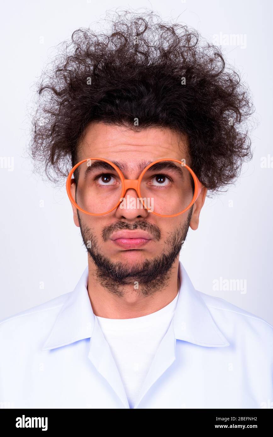 Face of Turkish man doctor with curly hair Stock Photo - Alamy