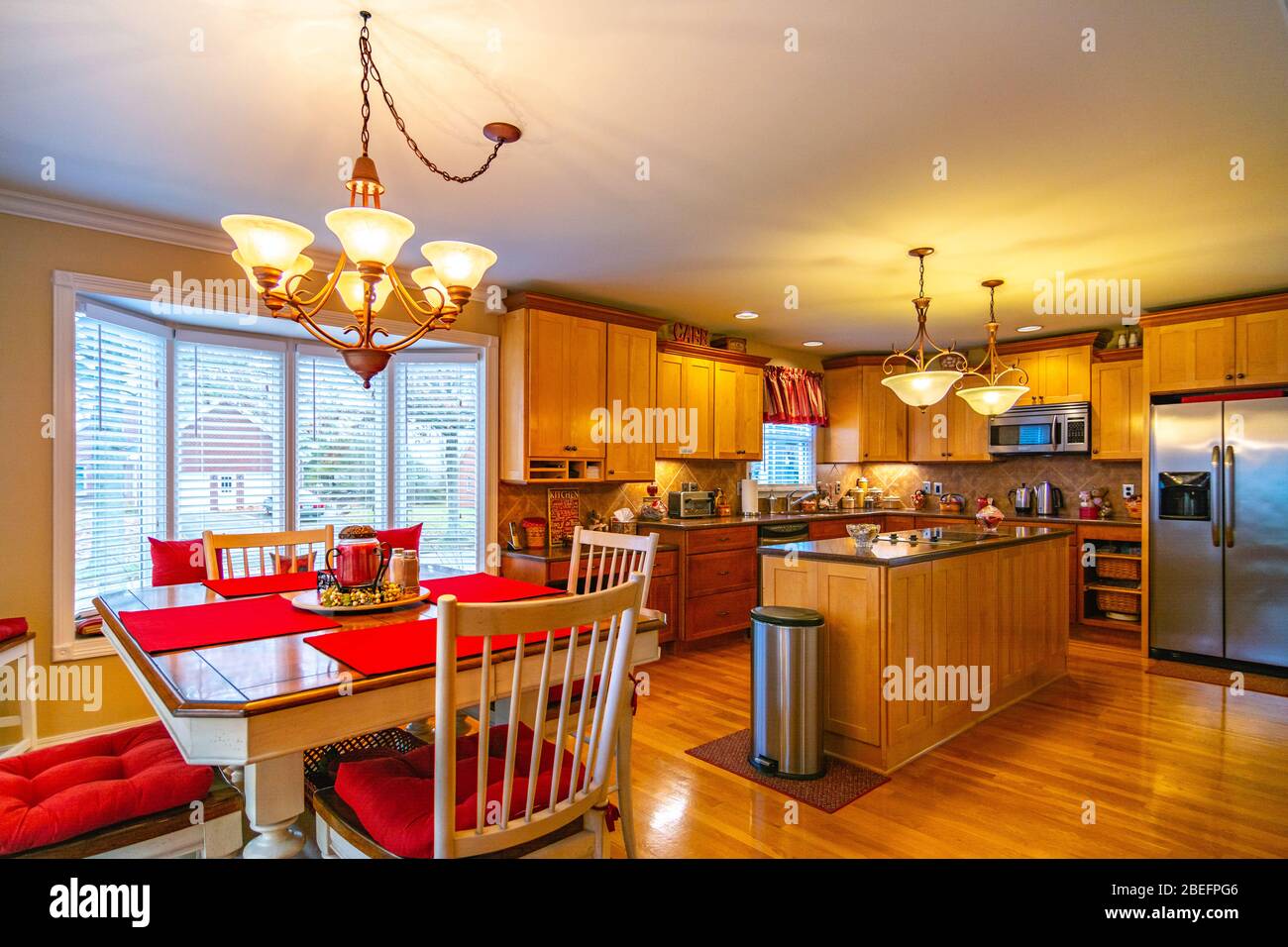 Kitchen and dining area in modern middle class house in Midwest America ...