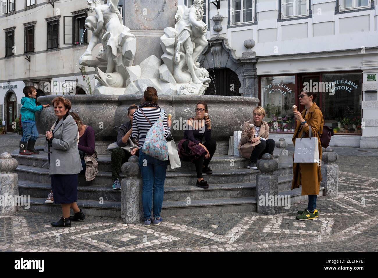 Eating ice-cream by Robbov vodnjak (Robb Fountain), an ornamental ...