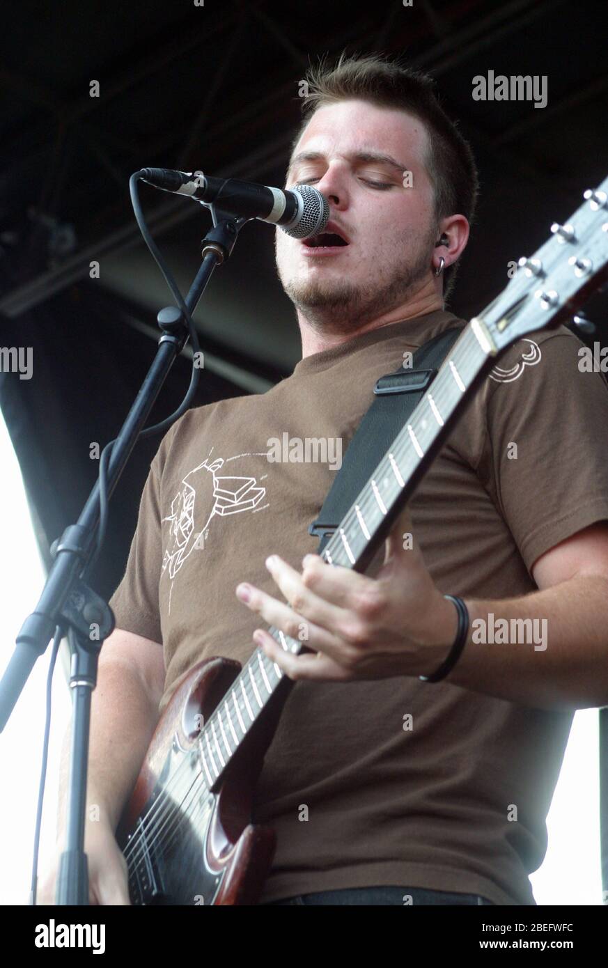 Thrice (Dustin Kensrue) performing at the 2003 Vans Warped Tour at the ...