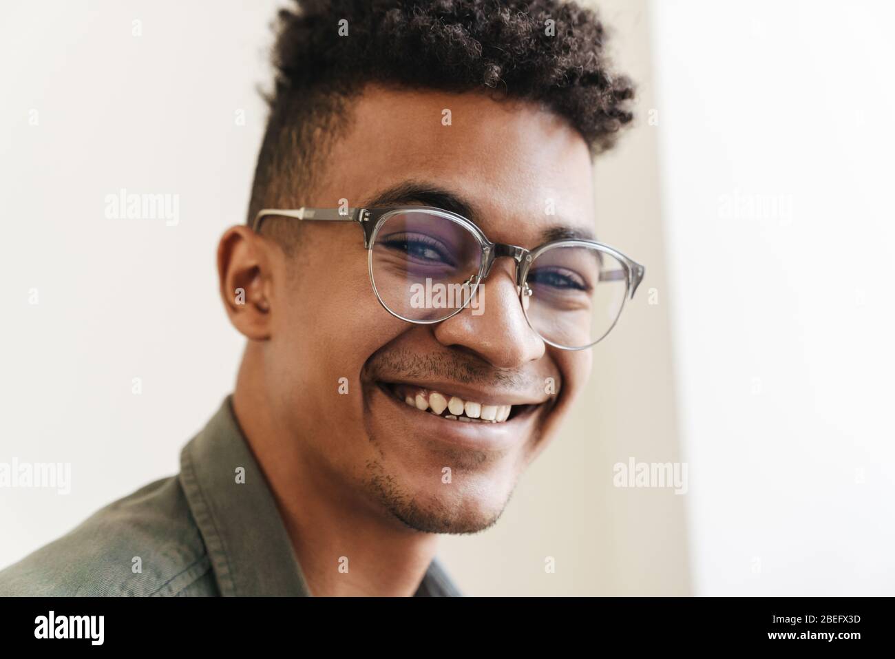 Closeup image of young happy positive smiling african guy in the ...