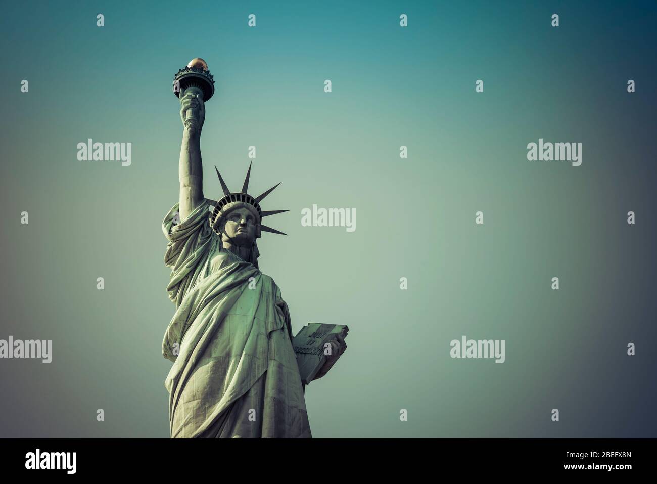 The statue of Liberty with blue sky background Stock Photo - Alamy