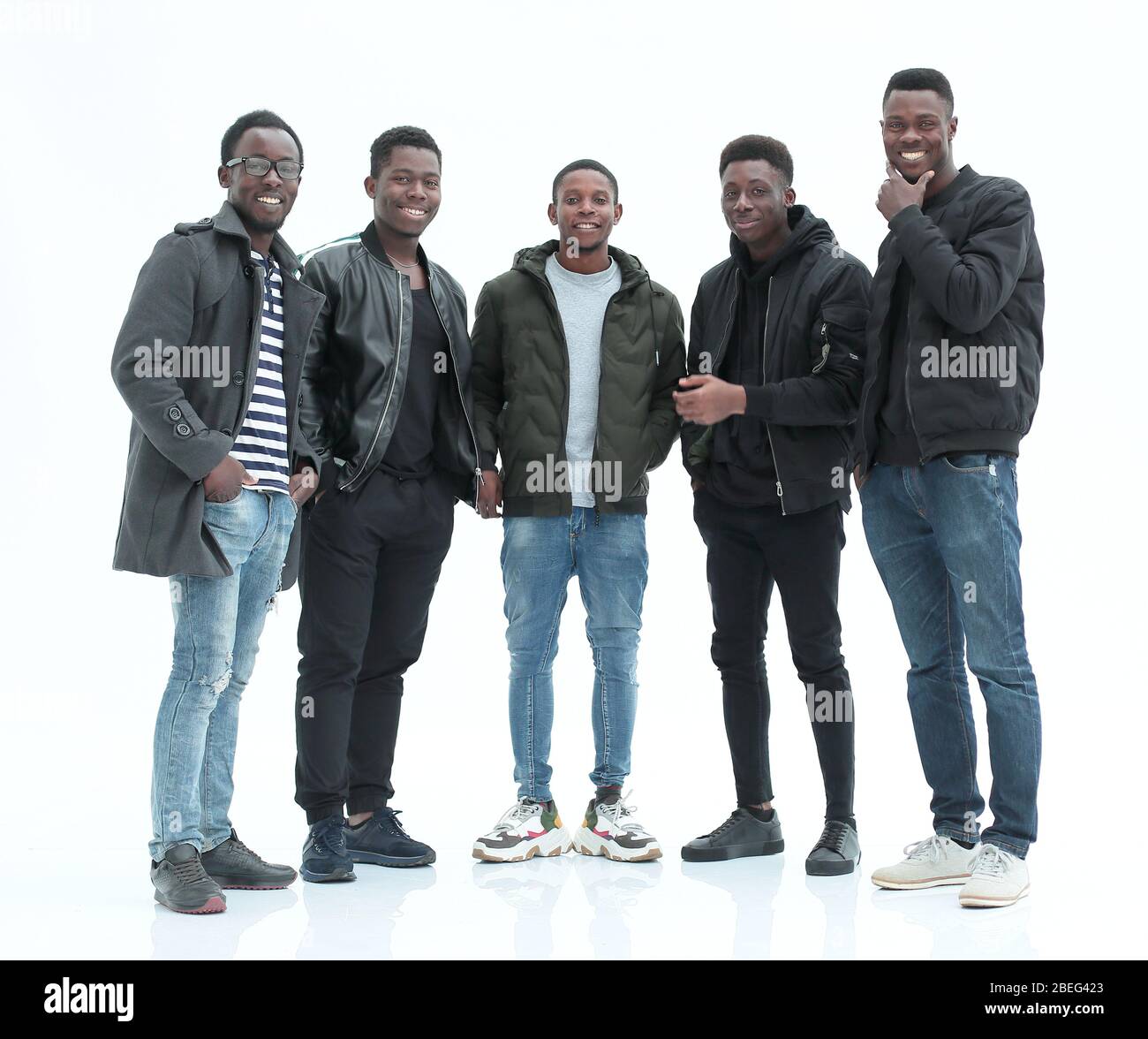 group of friendly guys standing together . isolated on white Stock ...