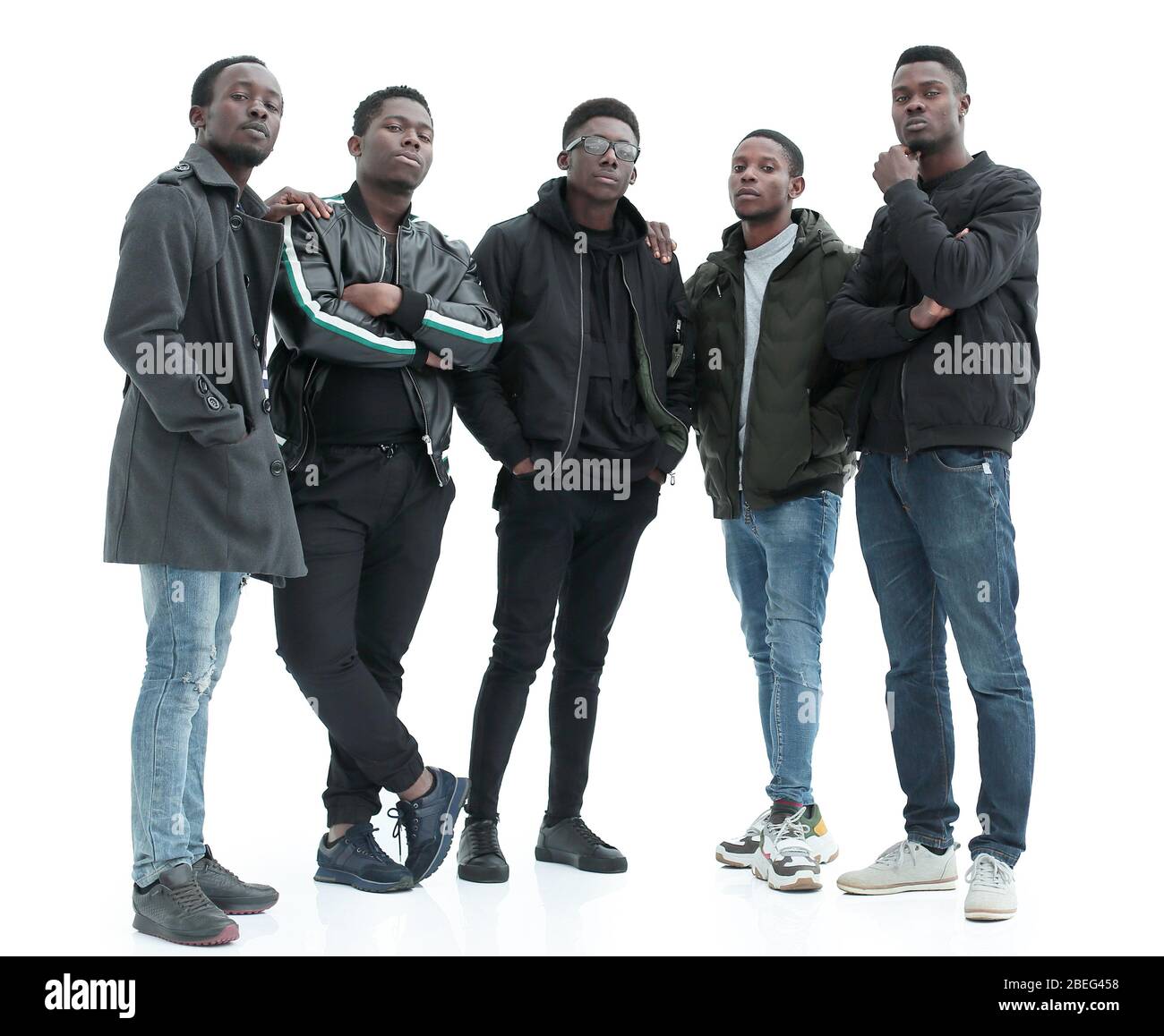 group of happy friends standing together . isolated on white Stock ...