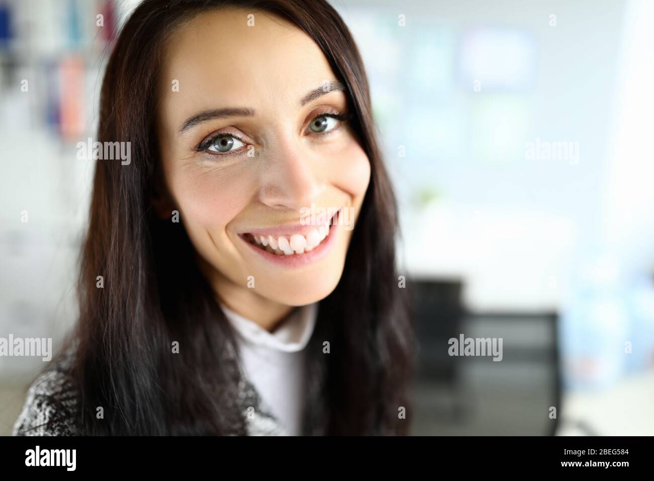 Happy good-looking lady with cute eyes Stock Photo - Alamy
