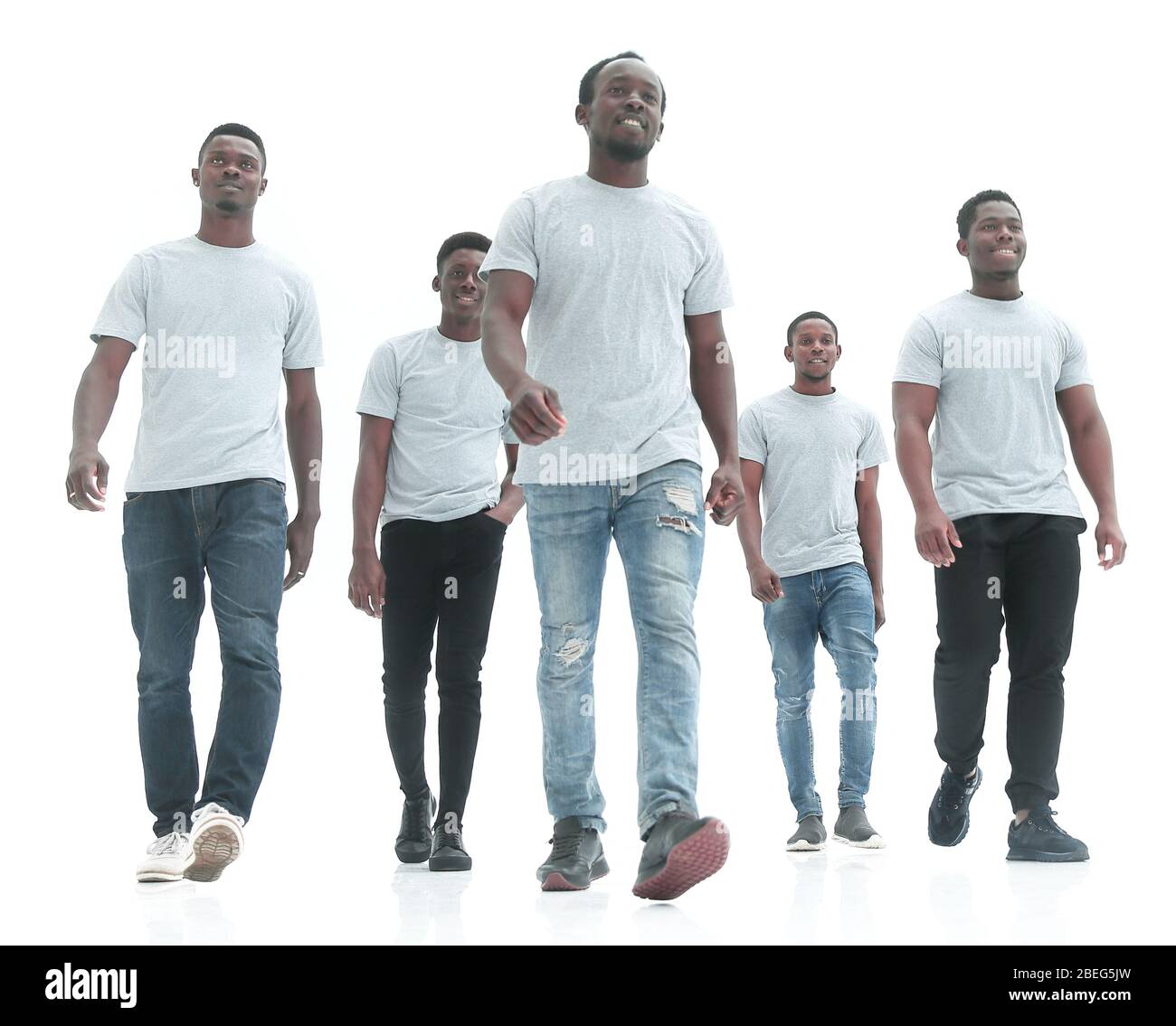 in full growth. team of young people stepping forward Stock Photo - Alamy