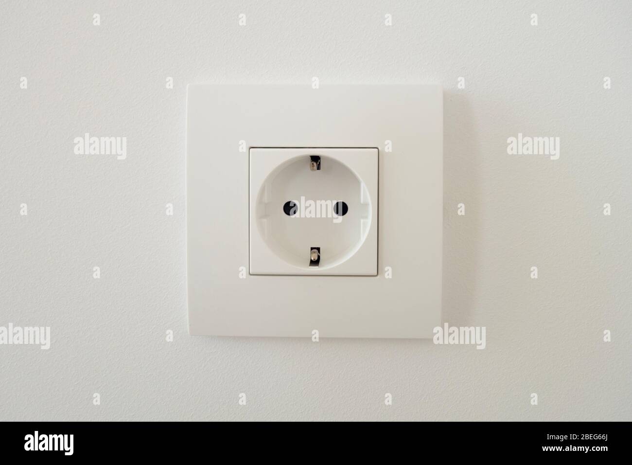 The socket is white EU standard with grounding Stock Photo - Alamy