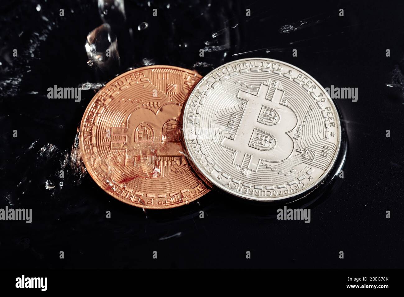 Bitcoin on black background. Bitcoin laundering with water Stock Photo ...