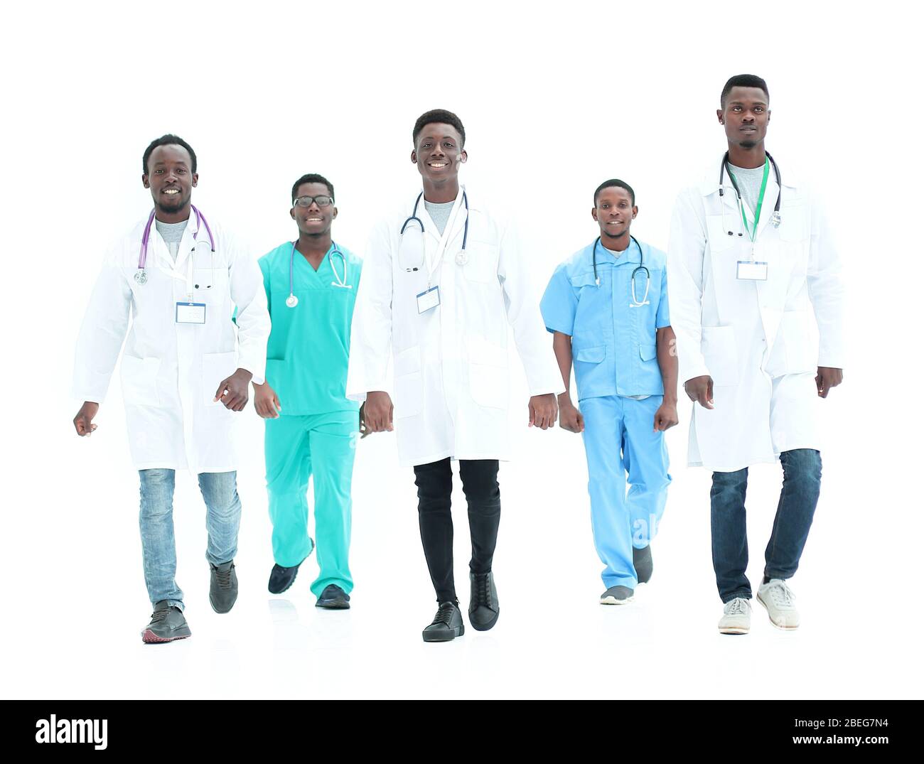 group of different doctors rush to the rescue. isolated on white Stock ...