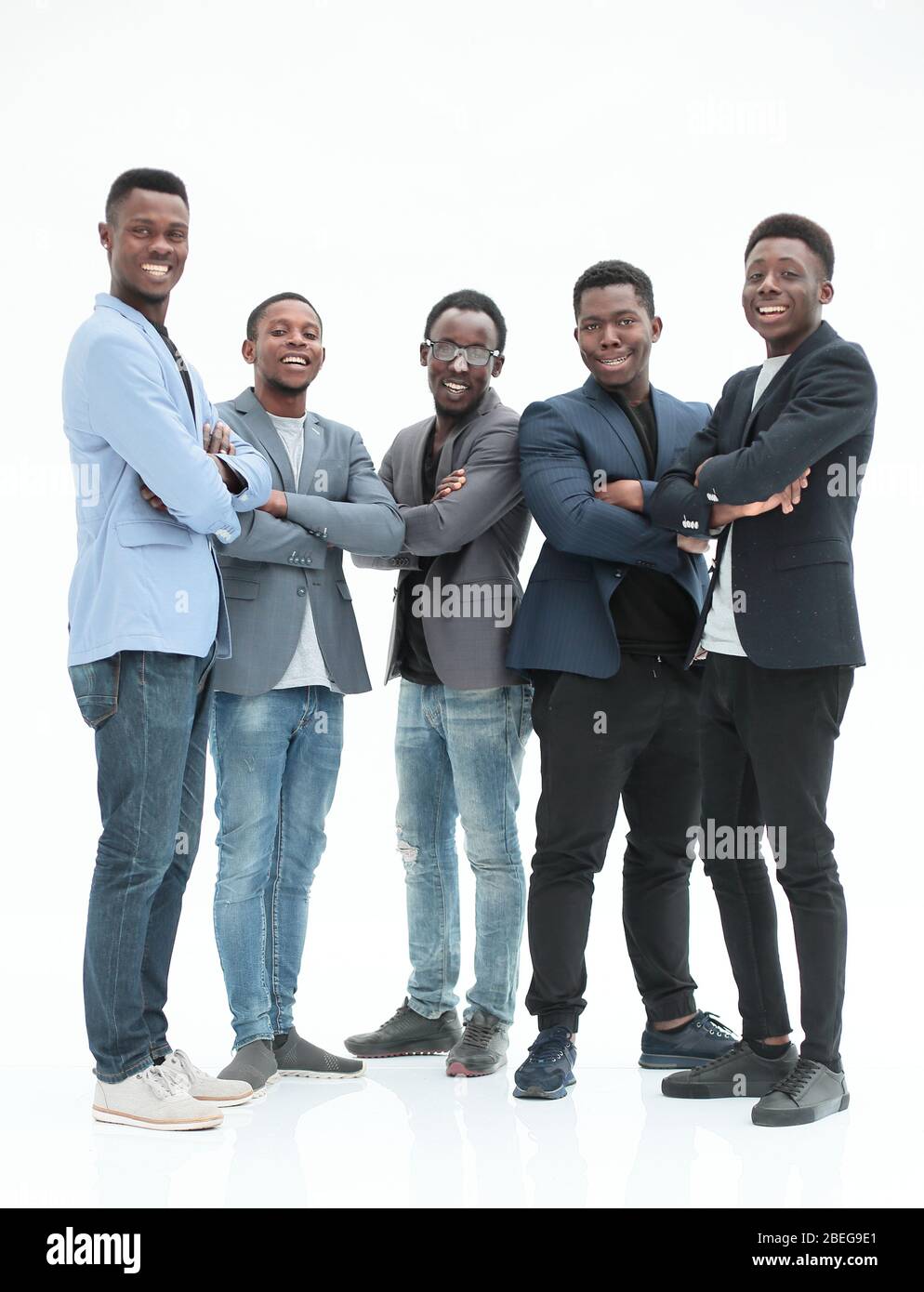 group of happy young business people standing together Stock Photo - Alamy