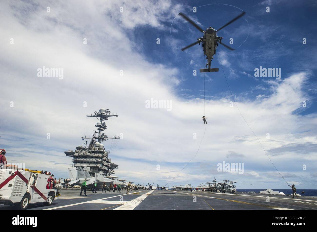 Helicopter rope suspension technique exercise 140909 Stock Photo - Alamy