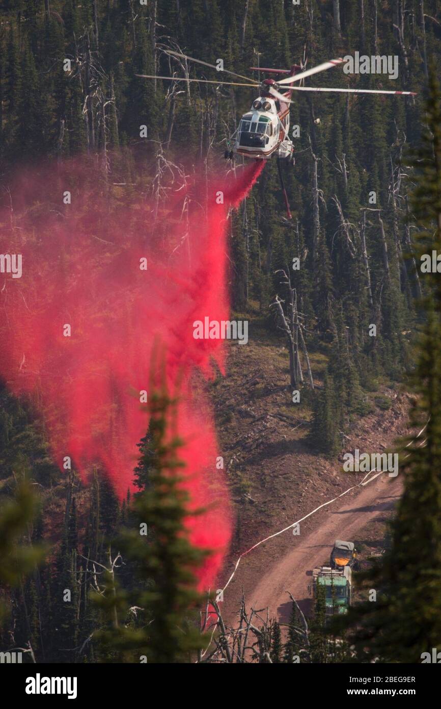 Helicopter retardant drop Stock Photo - Alamy