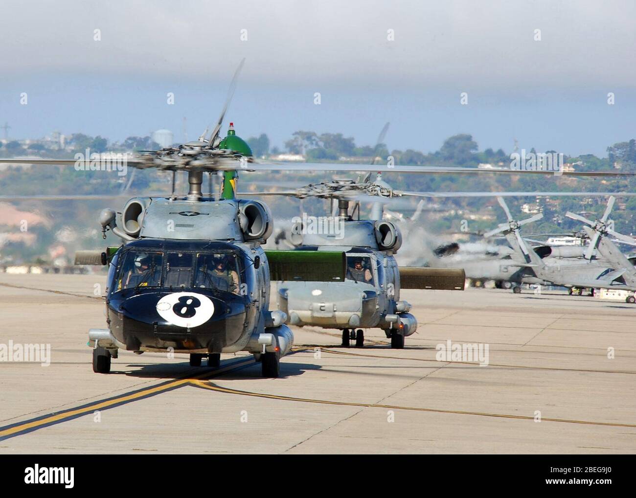 Helicopters arrive to their home base at Naval Air Station North Island ...