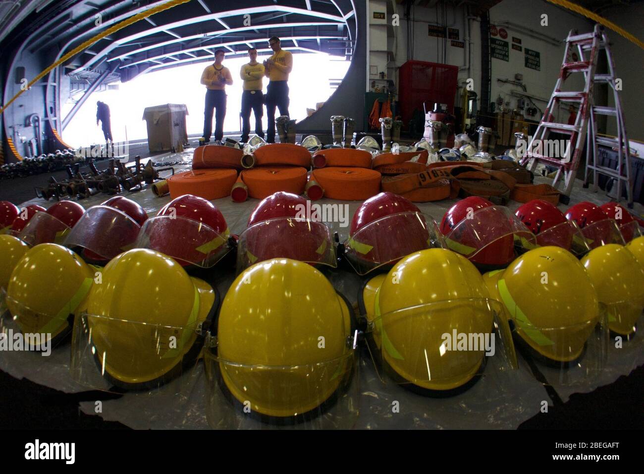 Helmet lineup for inspection 160614 Stock Photo - Alamy