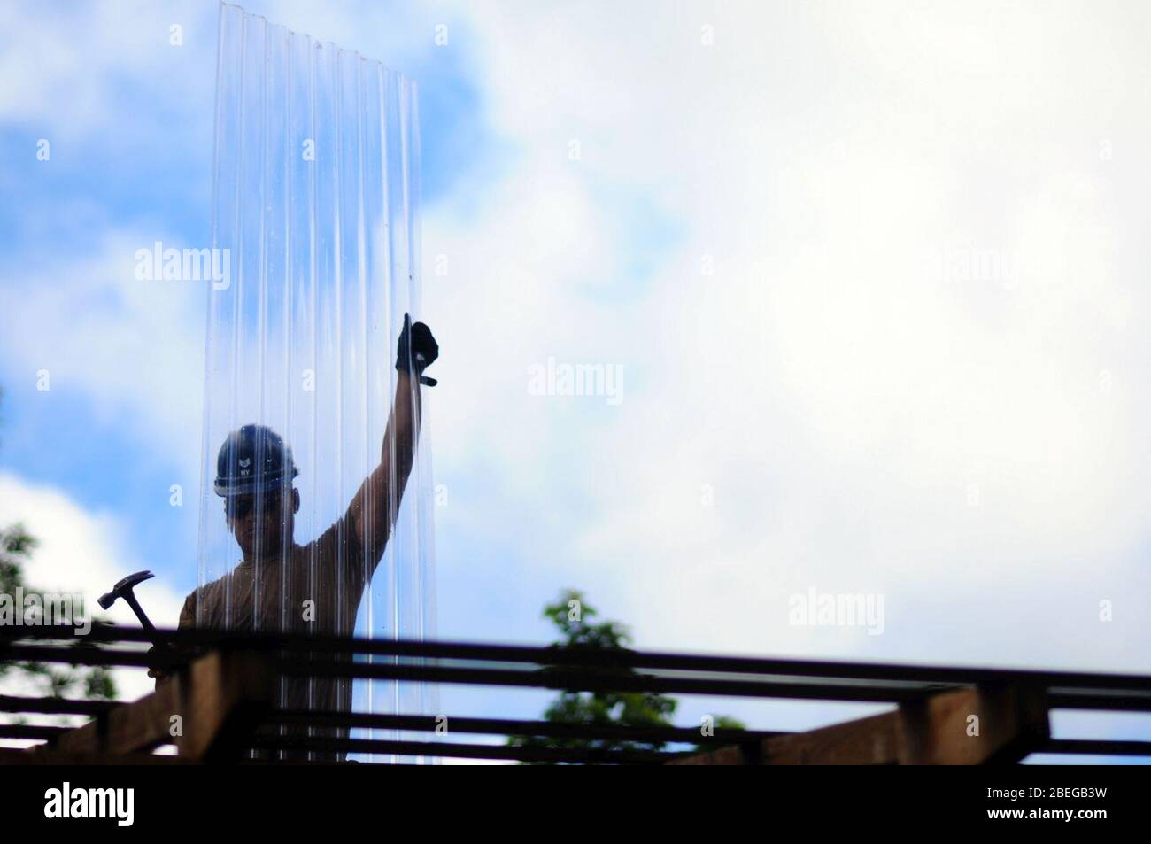 Helping to build a school Stock Photo - Alamy