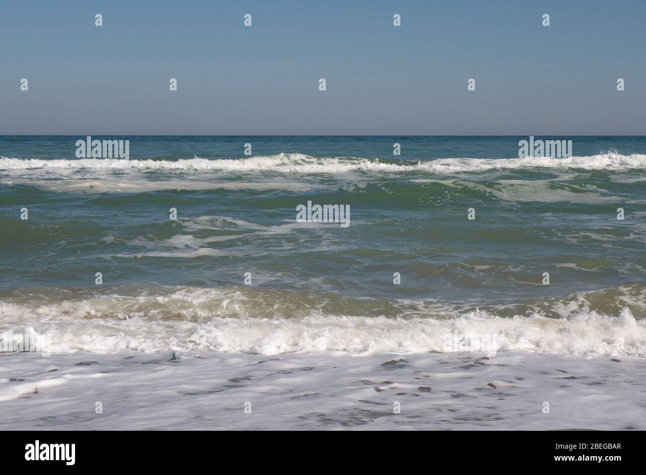 Sea, sea waves and shoreline on a sunny windy day Stock Photo - Alamy