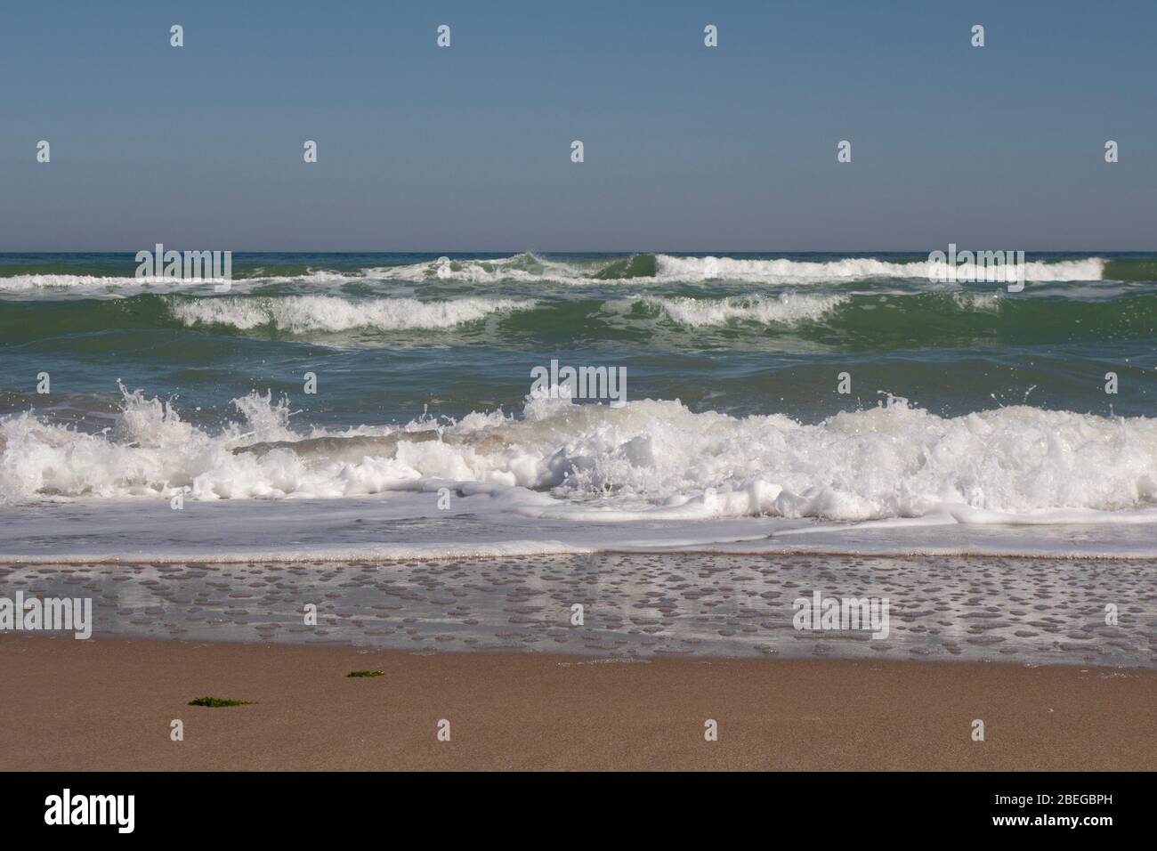 Sea, sea waves and shoreline on a sunny windy day Stock Photo - Alamy