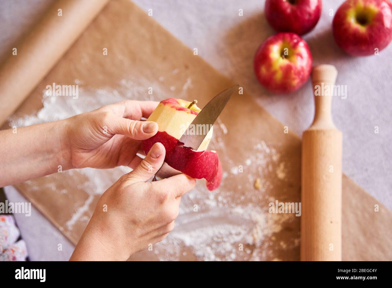 Peeling apple with knife hi-res stock photography and images - Alamy
