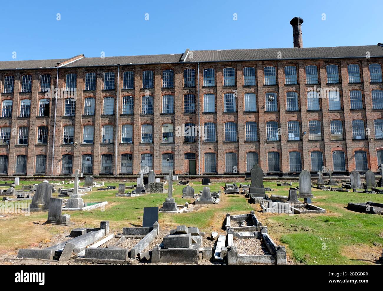 Large old lace factory and graveyard Stock Photo - Alamy