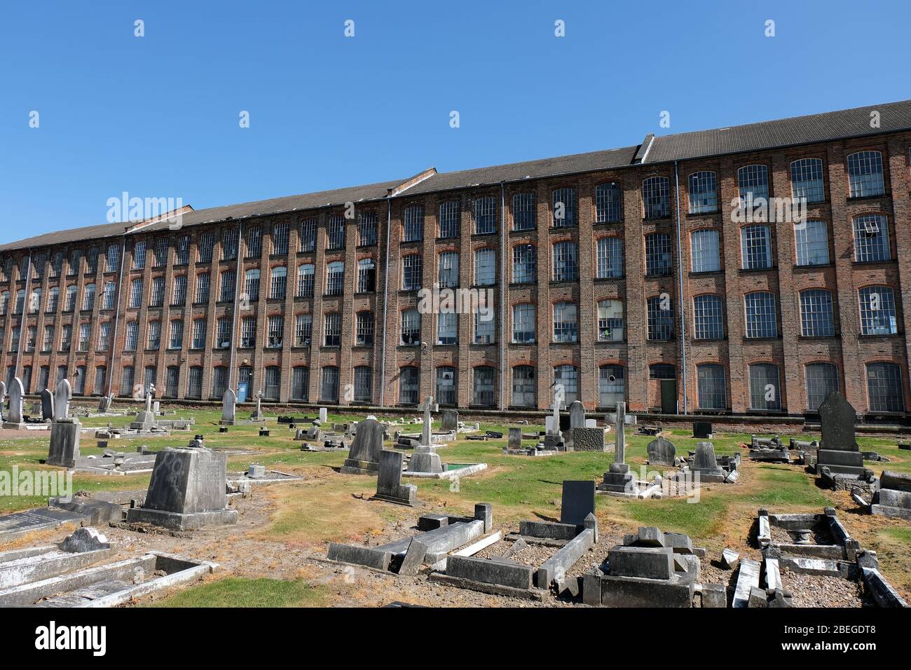 Large old lace factory and graveyard Stock Photo - Alamy