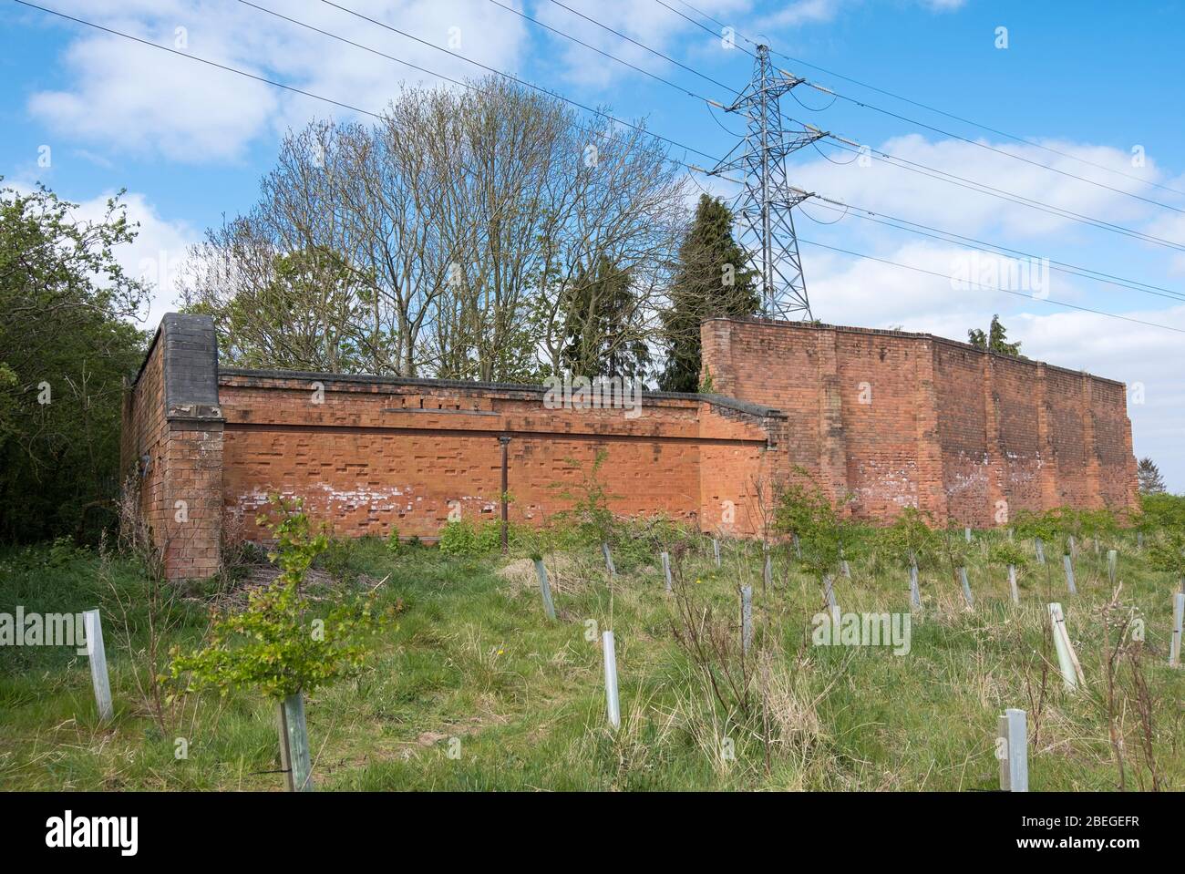 Tall brick wall of an old rifle range Stock Photo - Alamy