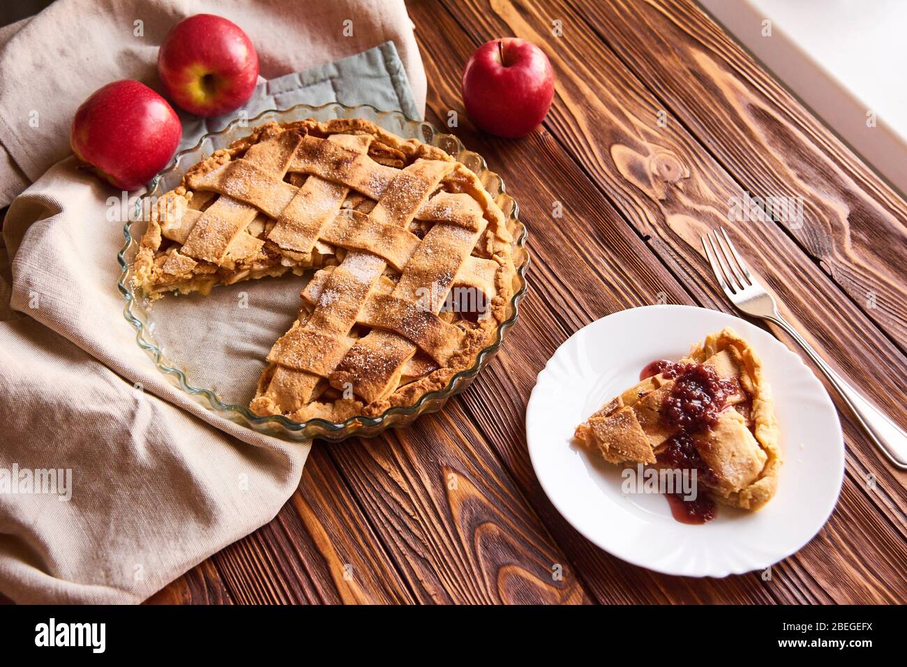Eating sweet food context. Traditional holidays apple pie, slice and ...
