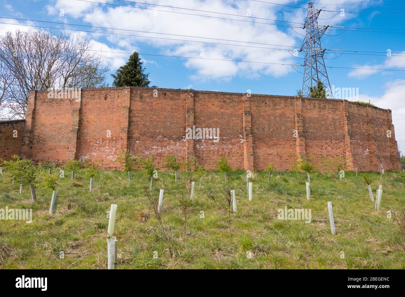 Tall brick wall of an old rifle range Stock Photo - Alamy