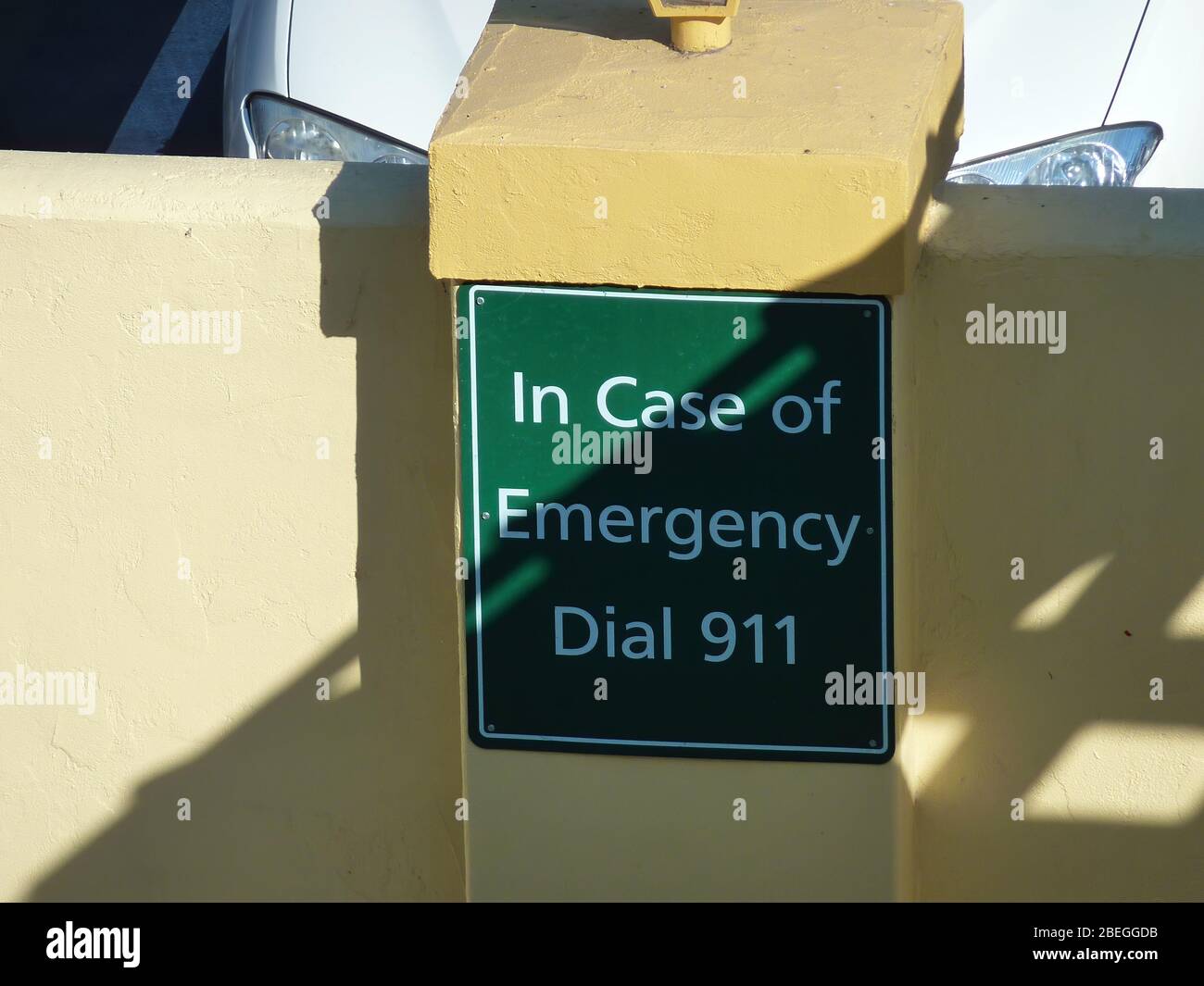 Sunny view of a in case of Emergency, Dial 911 sign at United States ...