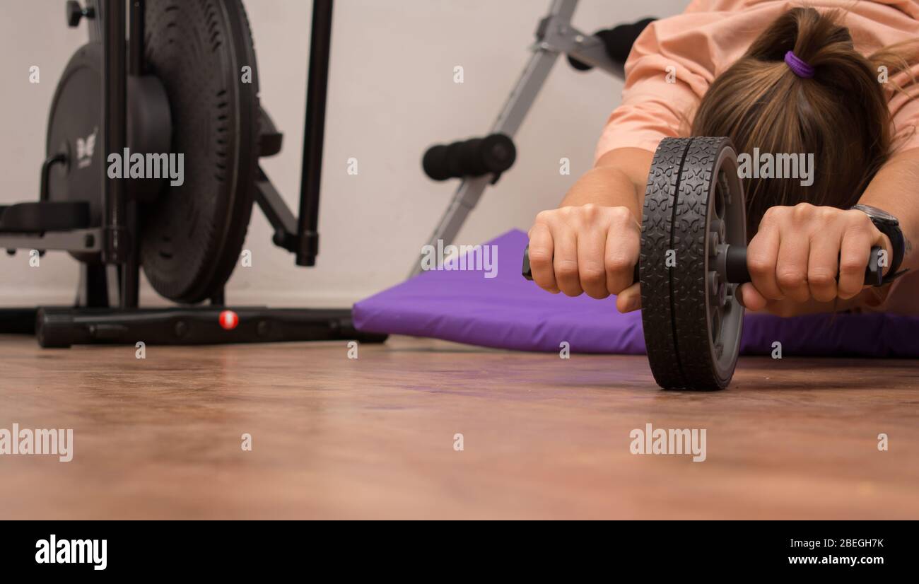 Woman doing muscle exercises hi-res stock photography and images - Alamy