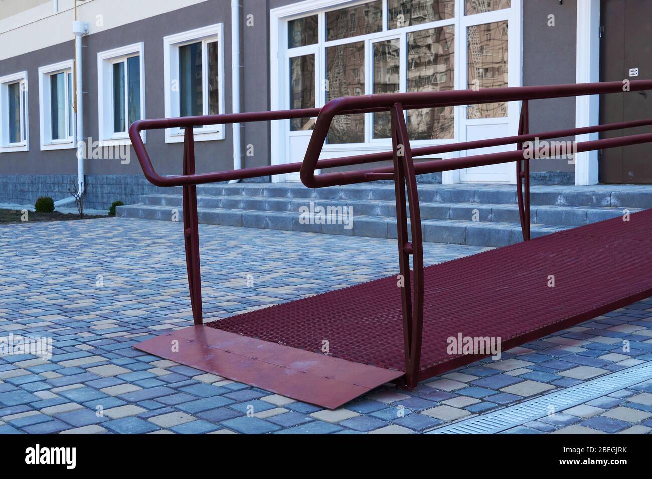 Wheelchair access ramp for entrance of residential multistory building ...