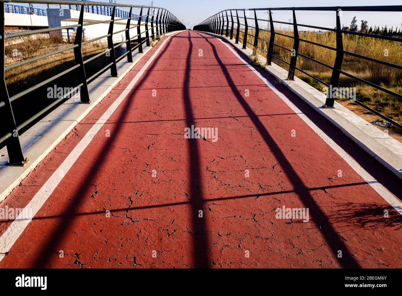 Bike path next to a concrete bridge in a rural area with good ...