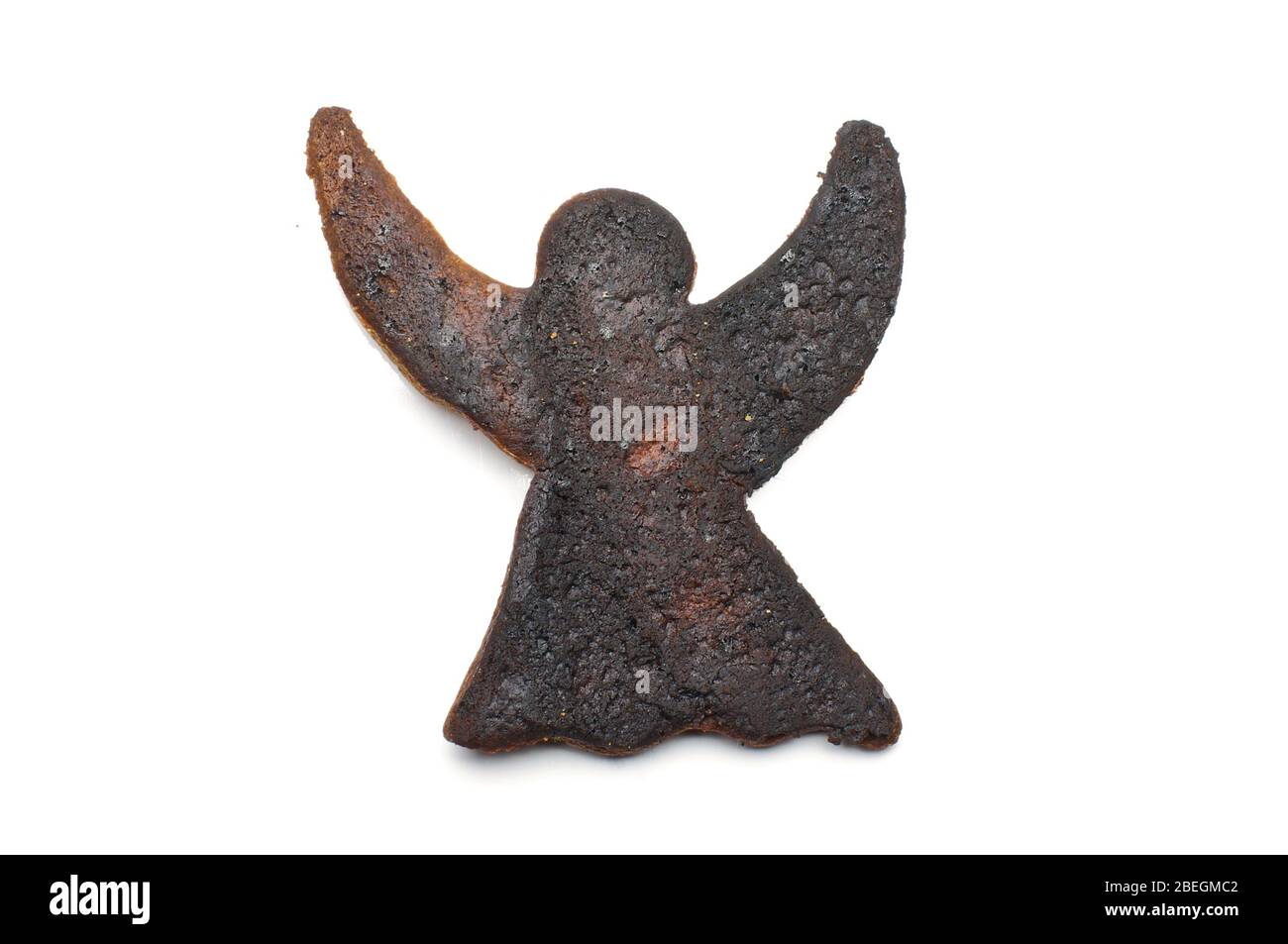 Burnt black gingerbread biscuit isolated on the white background Stock ...