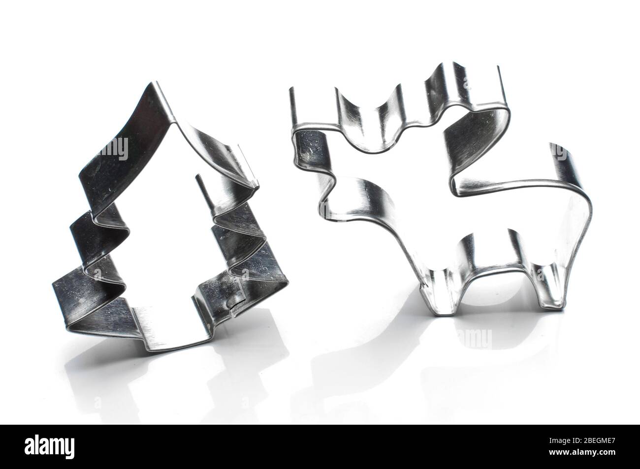 Tin foil christmas tree and elk shape for biscuits cooking isolated on ...