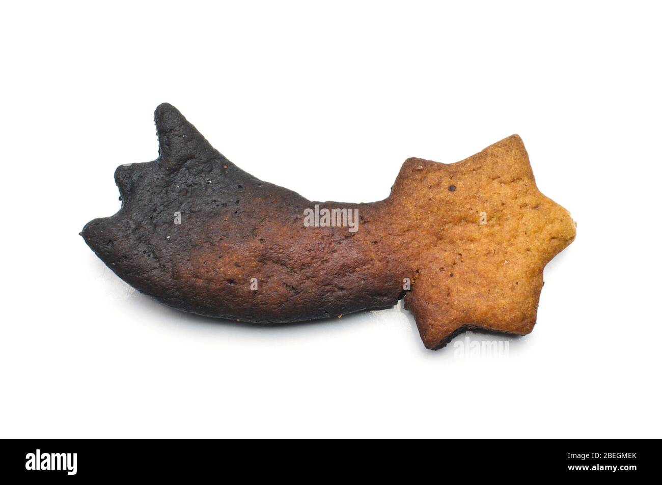 Burnt black gingerbread biscuit isolated on the white background Stock ...
