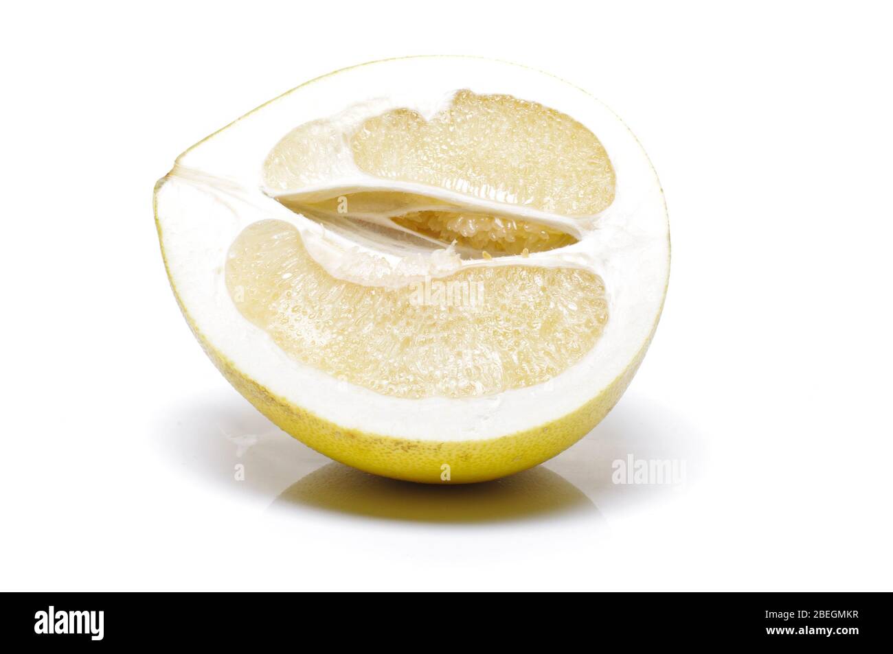 Half of pomelo fruit isolated on the white background Stock Photo - Alamy