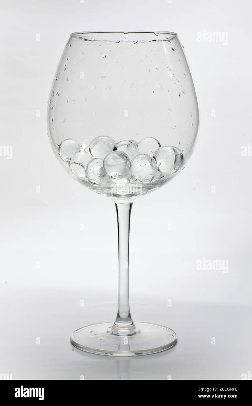 Glass bubbles in the wine glass isolated on the white background Stock ...
